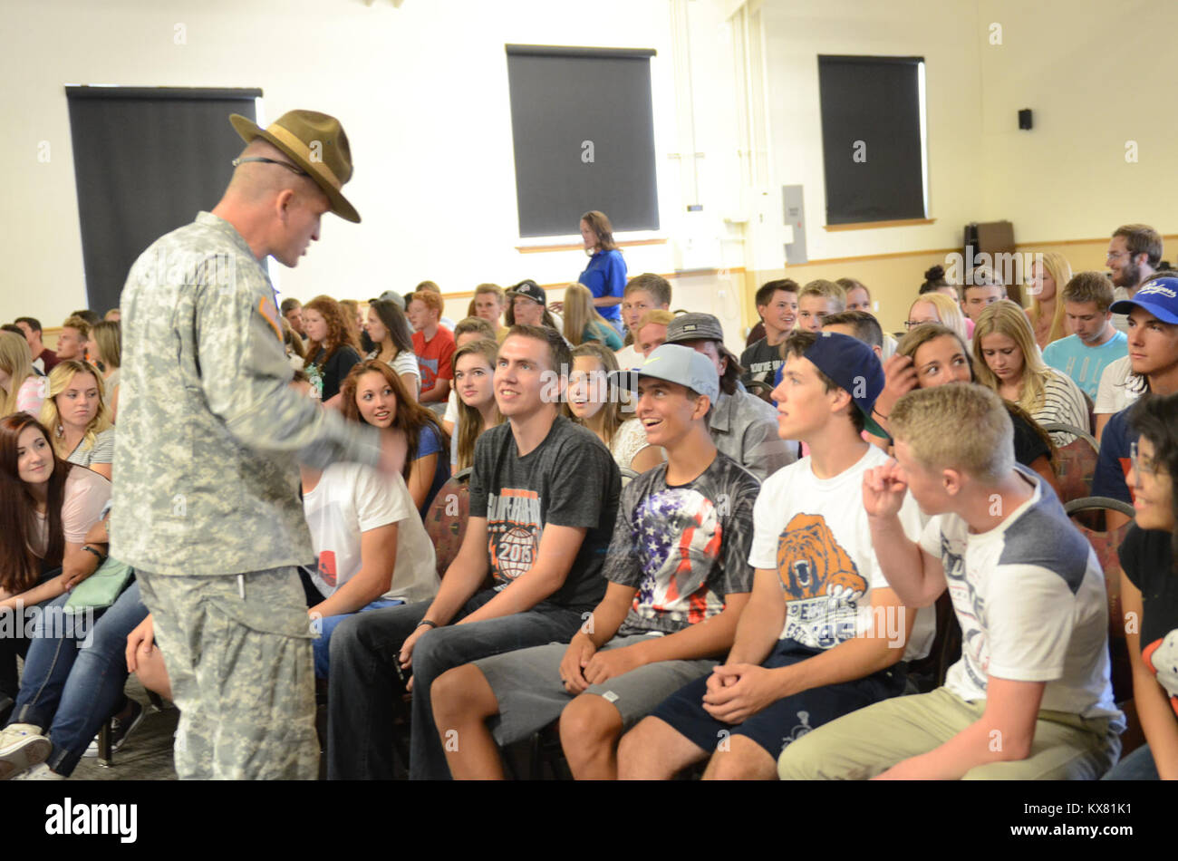 U.S. Army National Guard event with young people, drill sergeant ...