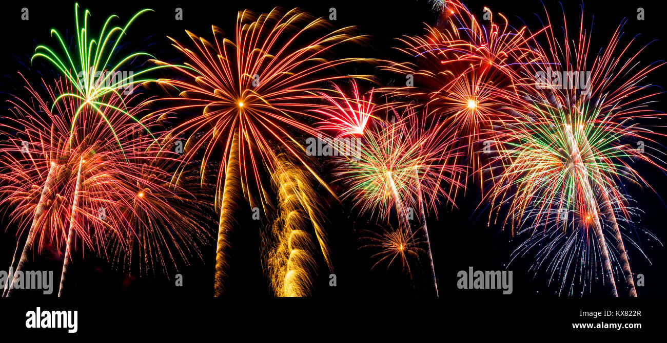 Beautiful fireworks fill the night time sky Stock Photo - Alamy