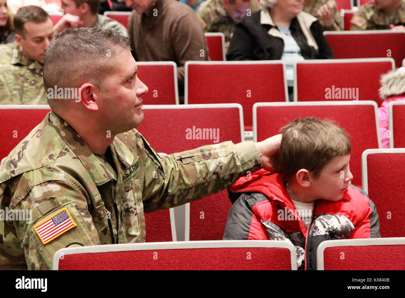US Army National Guard with family at awards and promotion presentation ...