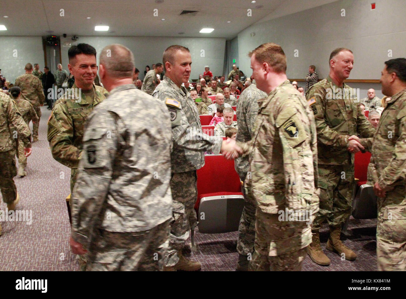 US Army National Guard and families meet and greet friends Stock Photo ...