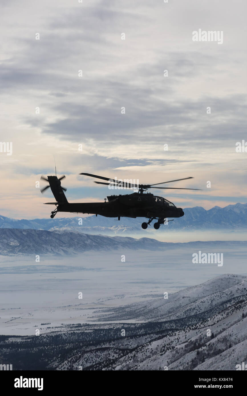 US Army National Guard veteran AH-64 Apache helicopter pilot flying and ...