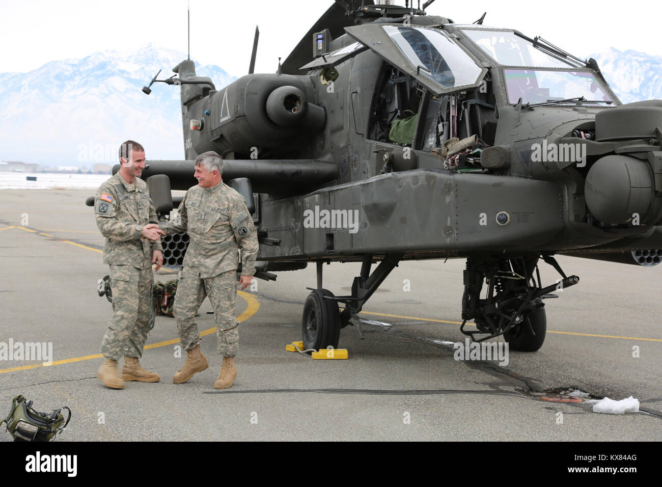US Army National Guard veteran AH-64 Apache helicopter pilot flying and ...