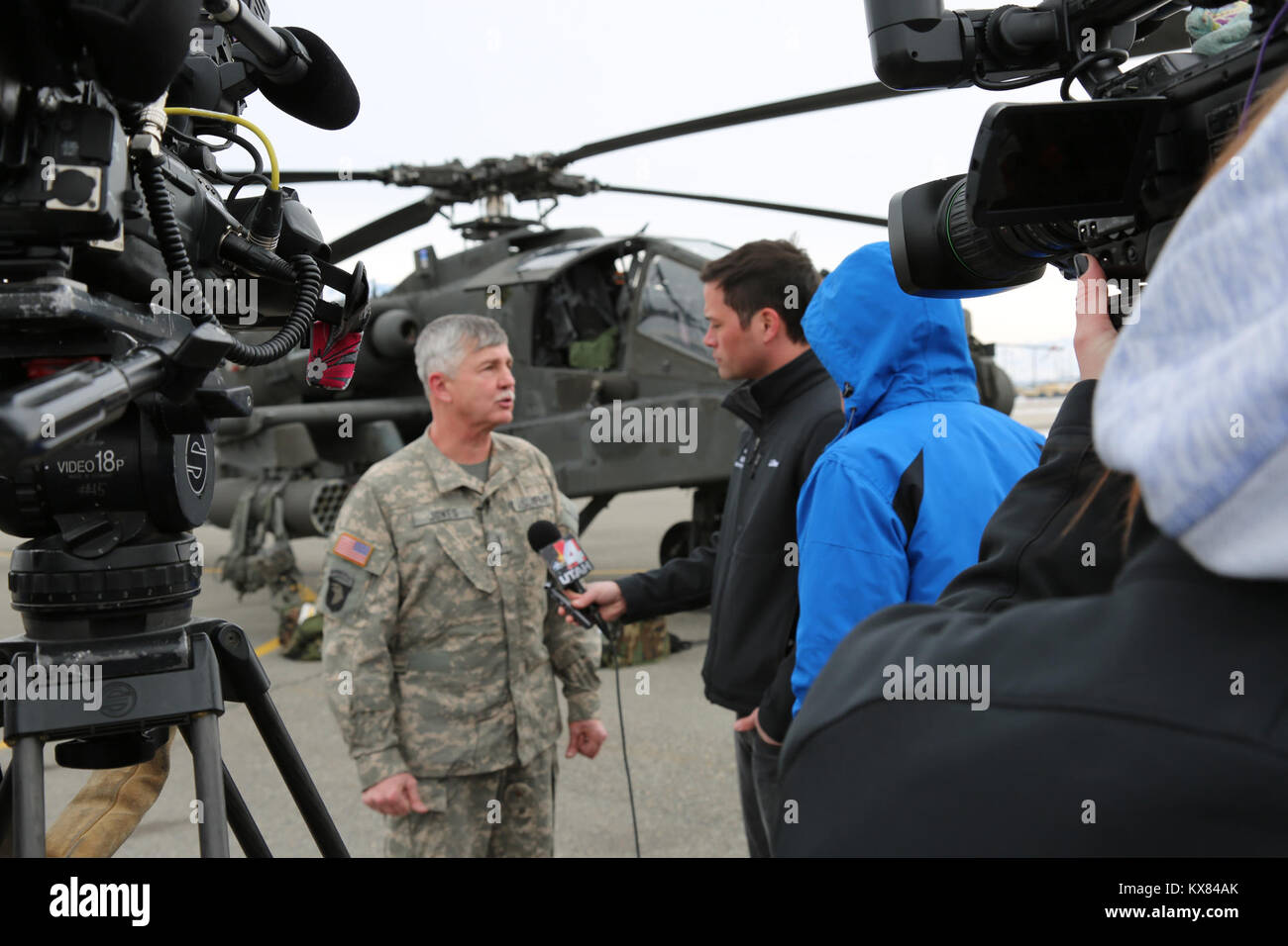 US Army National Guard veteran AH-64 Apache helicopter pilot flying and ...