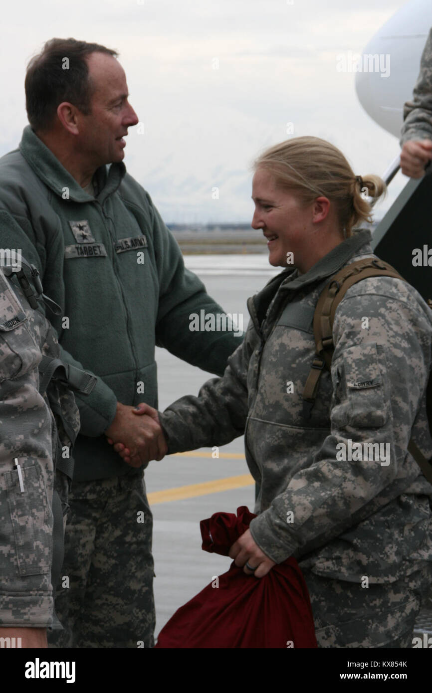 US Army National Guard welcome home from family and friends after ...