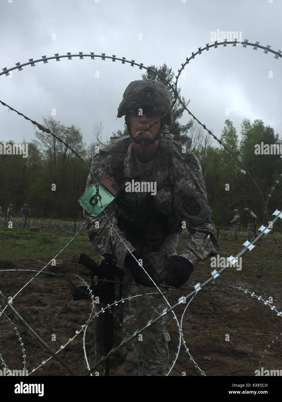 US Army National Guard military training in the field. Practicing ...
