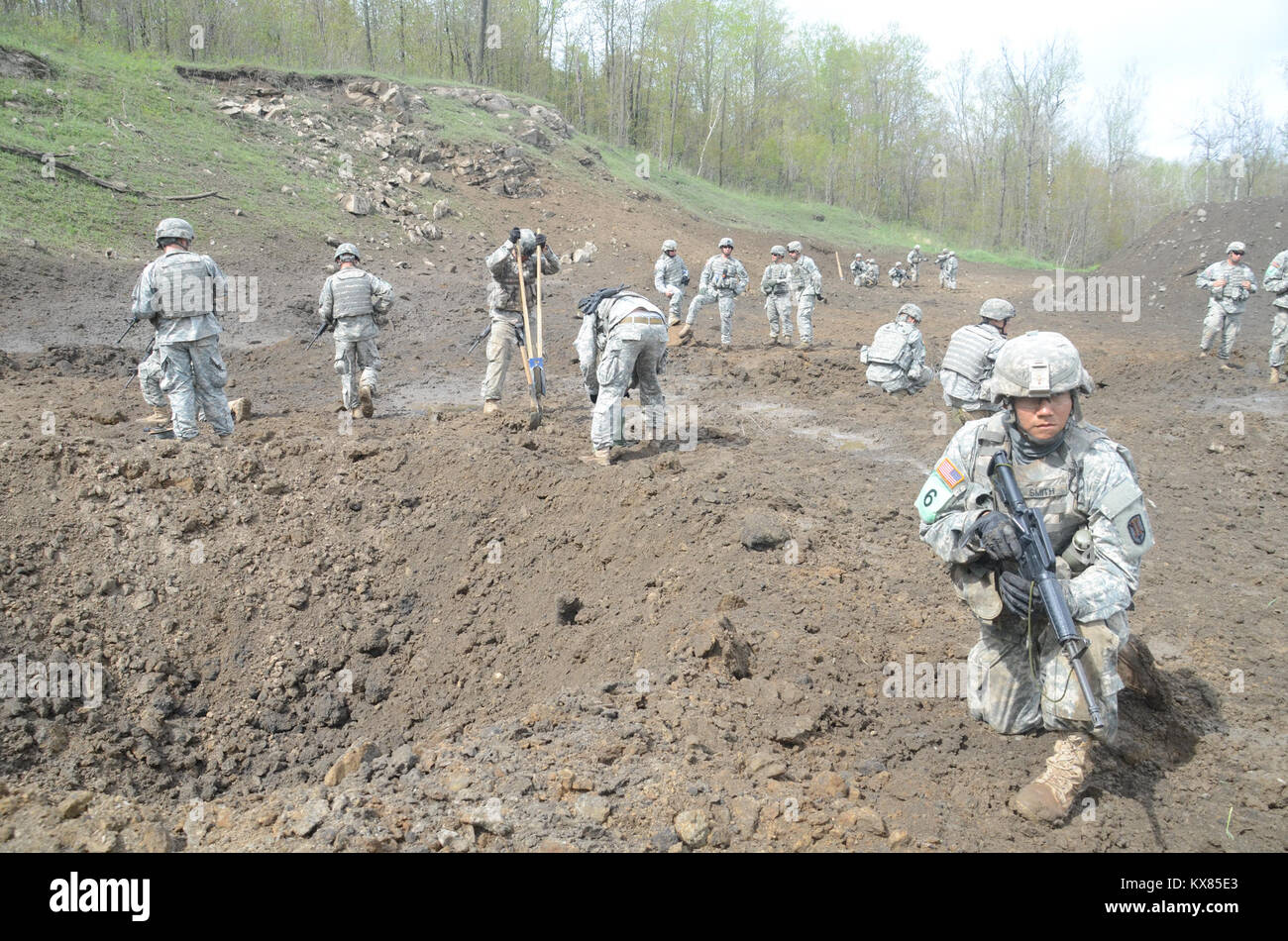 US Army National Guard military training in the field. Practicing ...