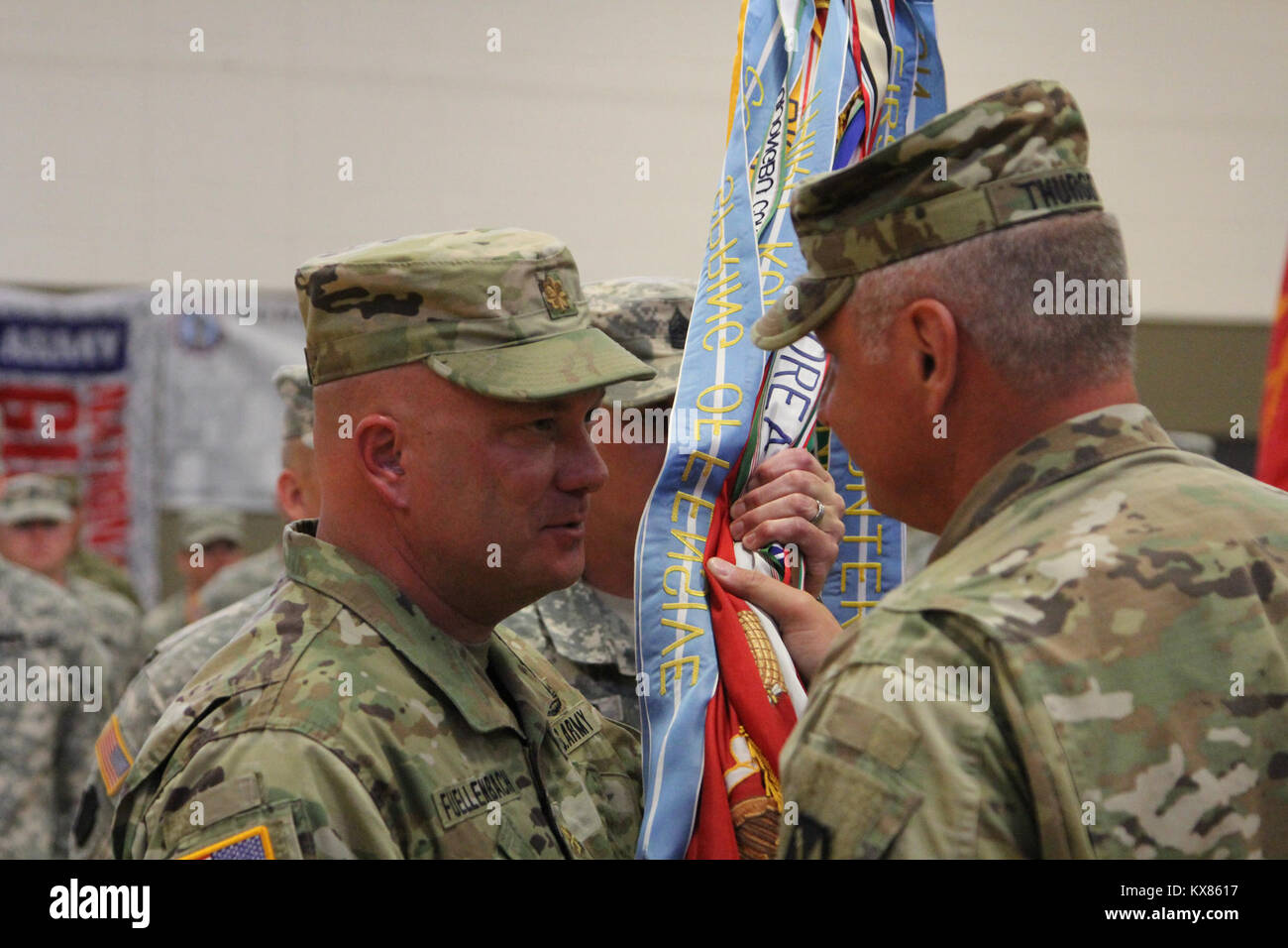 Col. Todd Thursby, 65th Field Artillery Brigade commander, passes the ...