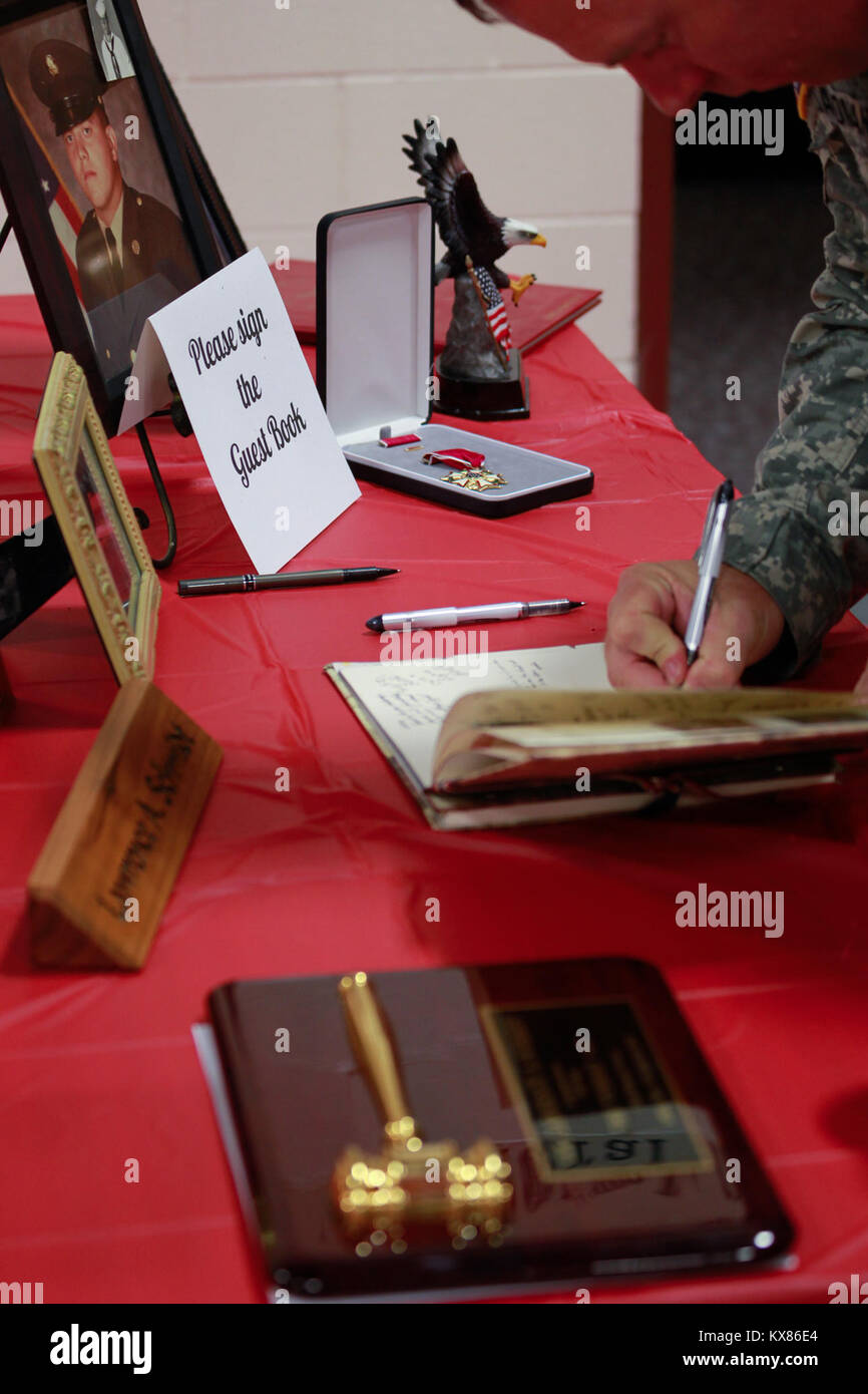 US military remembrance to fallen soldier, please sign the guest book ...