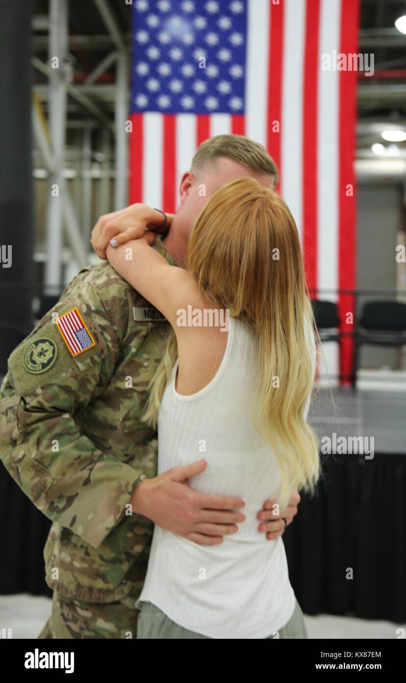 US Army National Guard welcome home from family and friends after ...