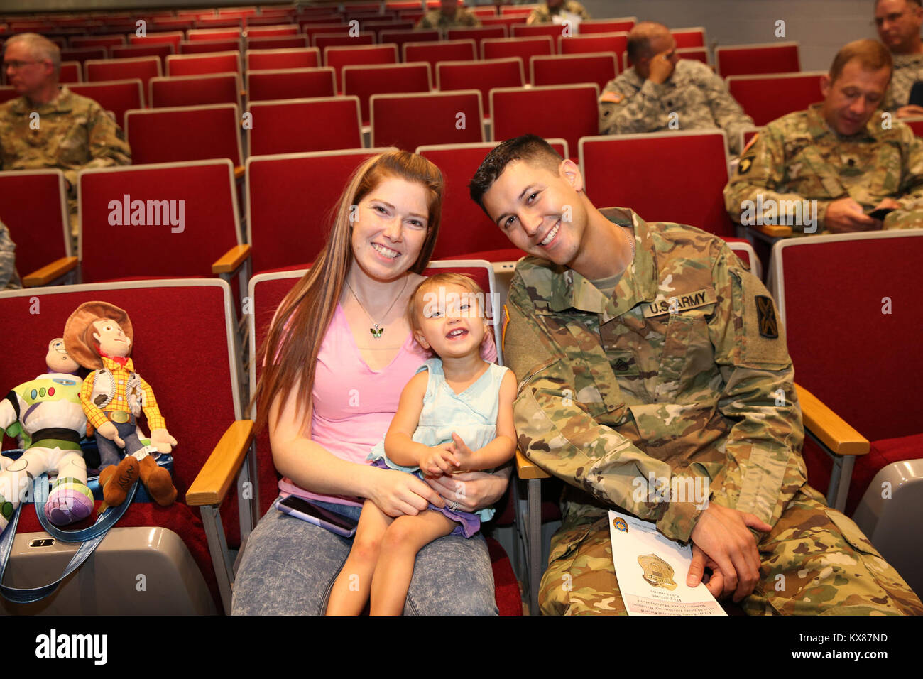 US Army National Guard with family at awards and promotion presentation ...