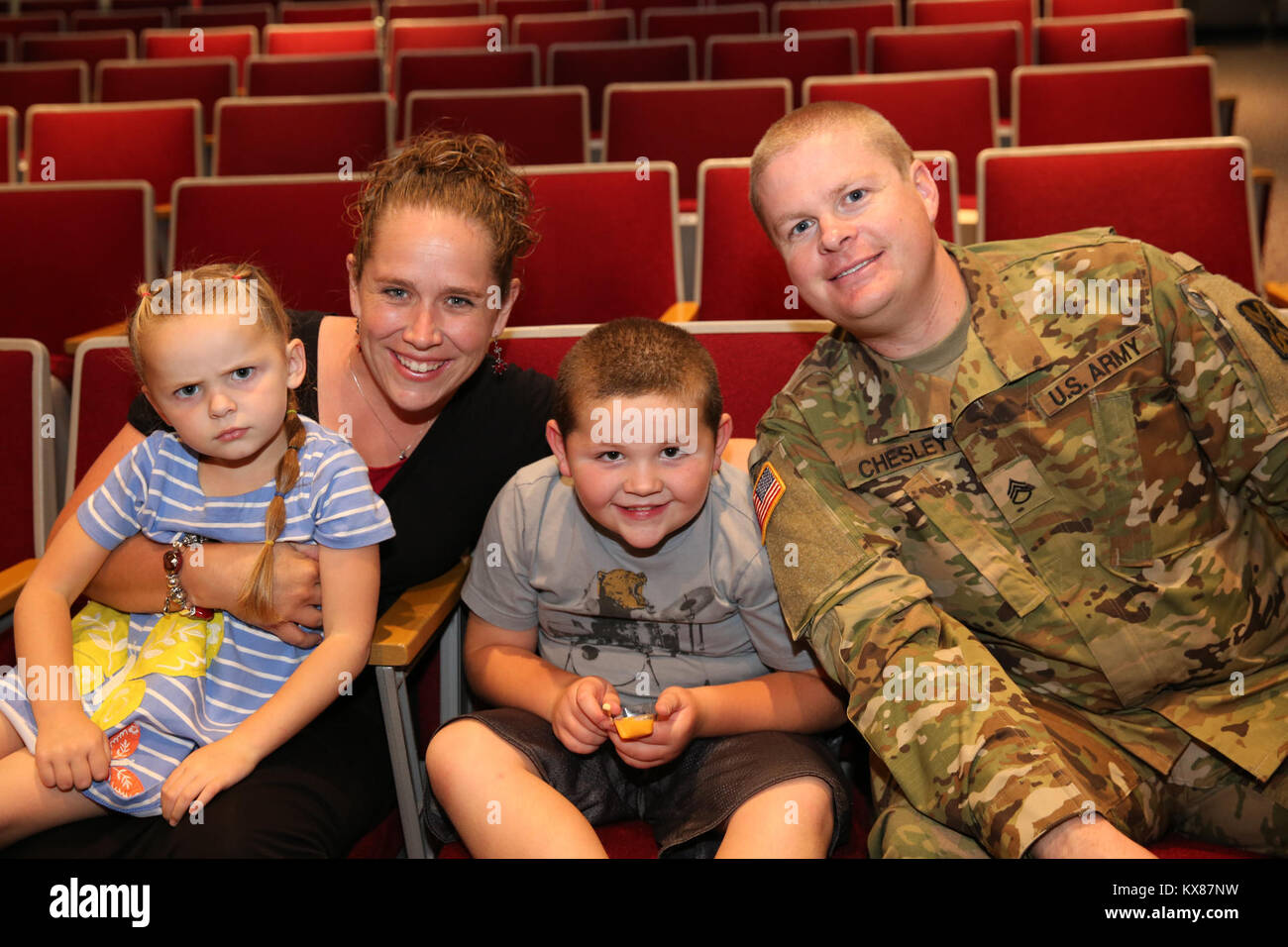 US Army National Guard with family at awards and promotion presentation ...
