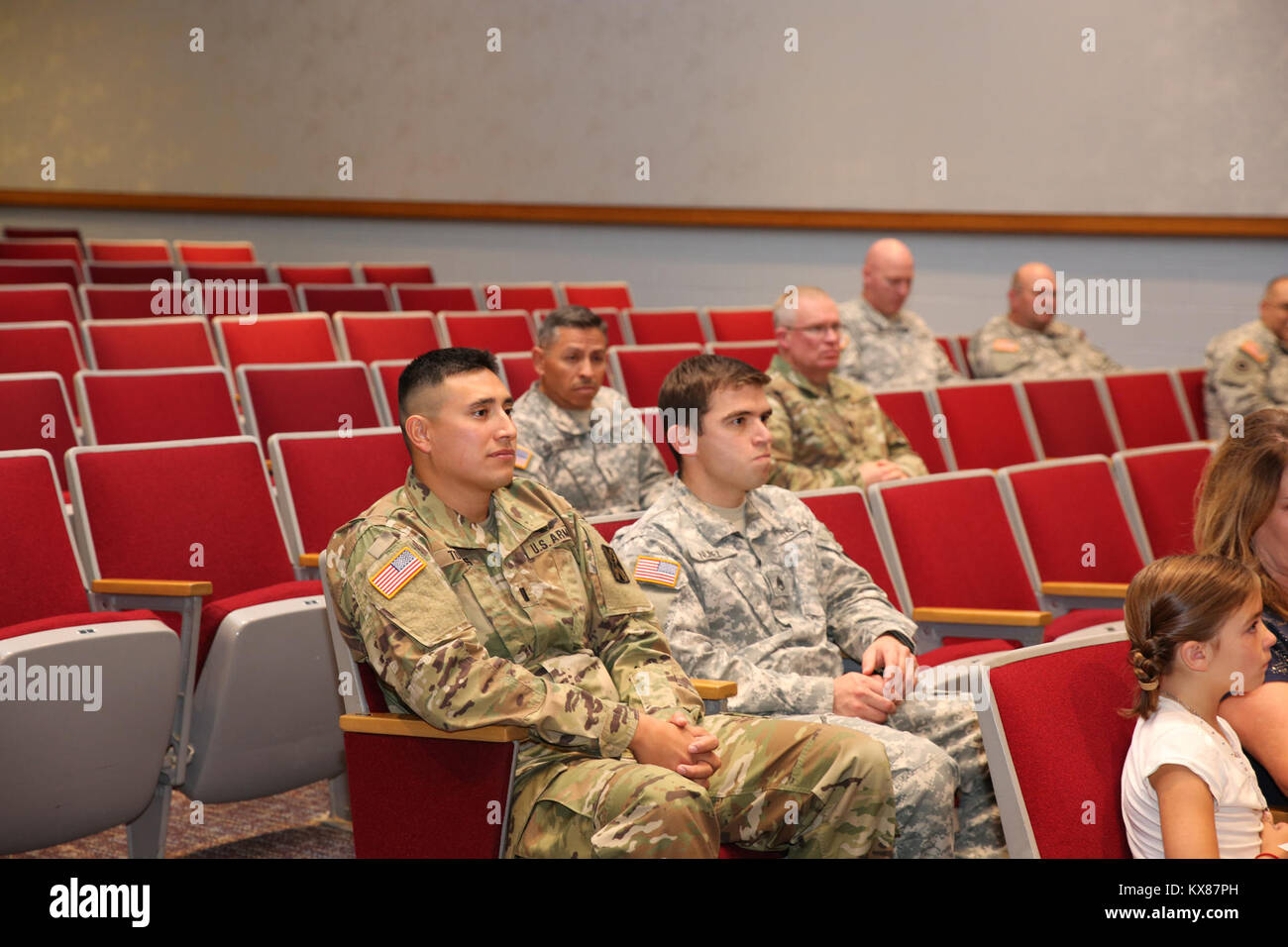 US Army National Guard with families at inddor ceremony Stock Photo - Alamy