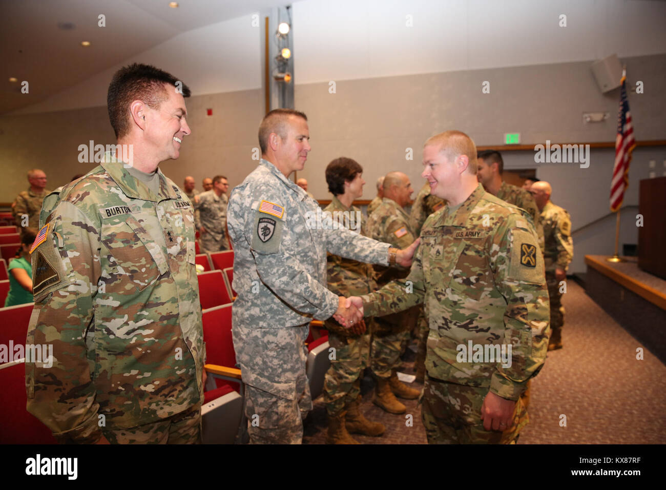 US Army National Guard with family at awards and promotion presentation ...