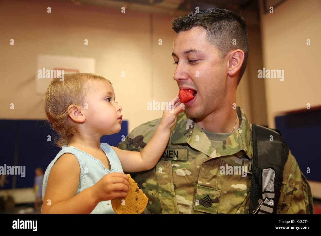 US Army National Guard with family at awards and promotion presentation ...