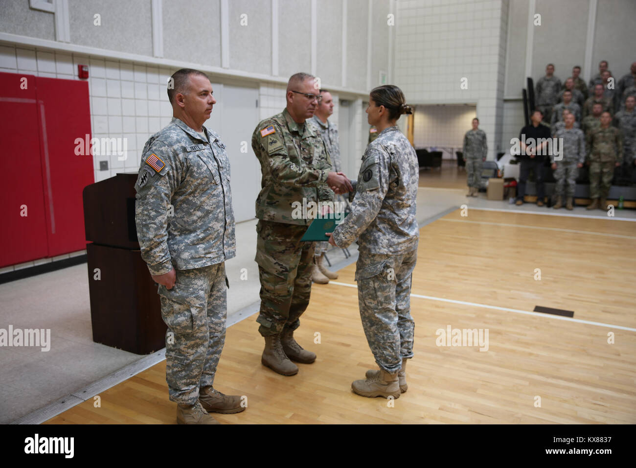 US Army National Guard with family at awards and promotion presentation ...