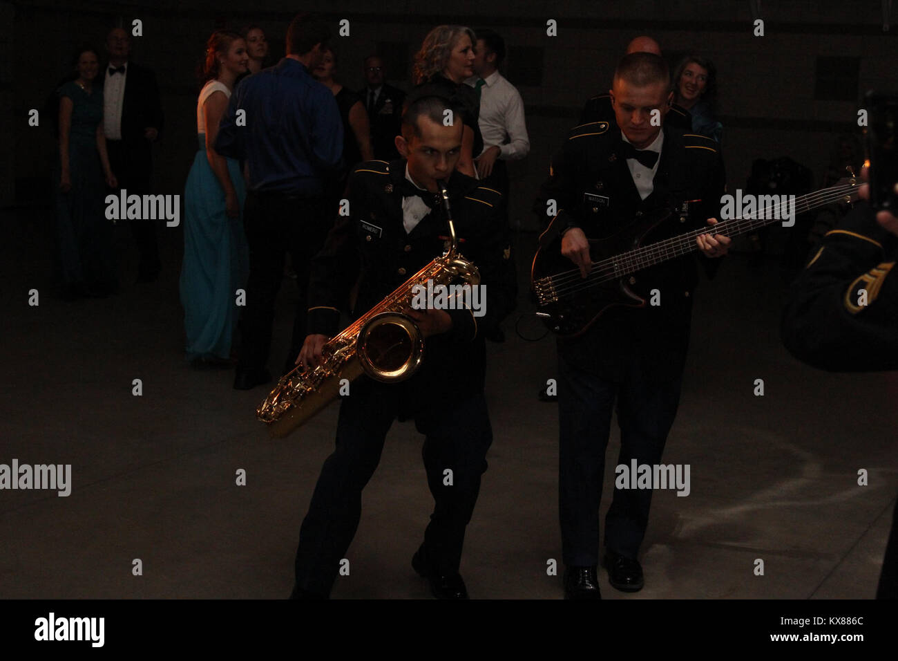 US Army National Guard personnel and families at music concert.and ...