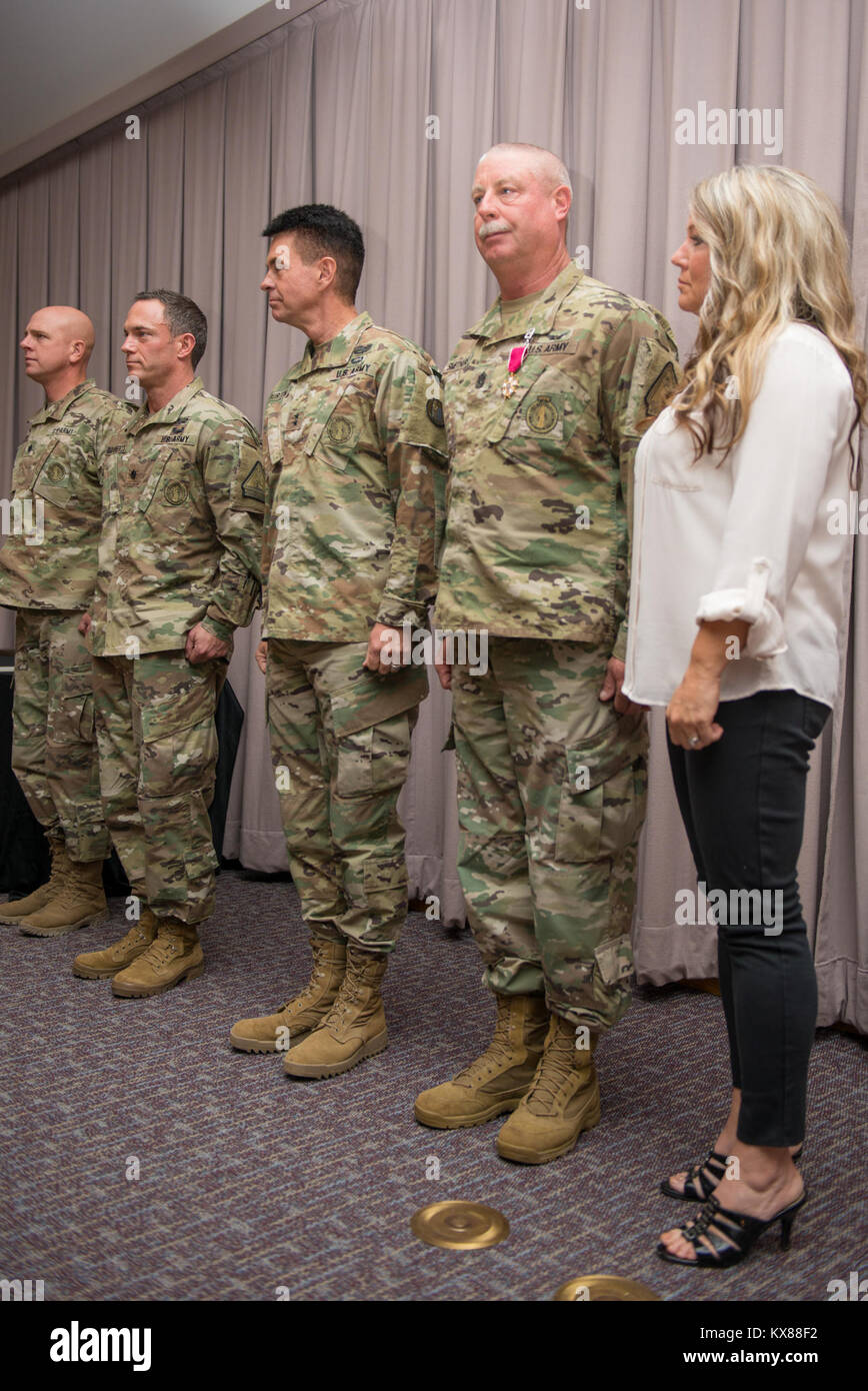 US Army National Guard with family at wards and promotion presentation ...