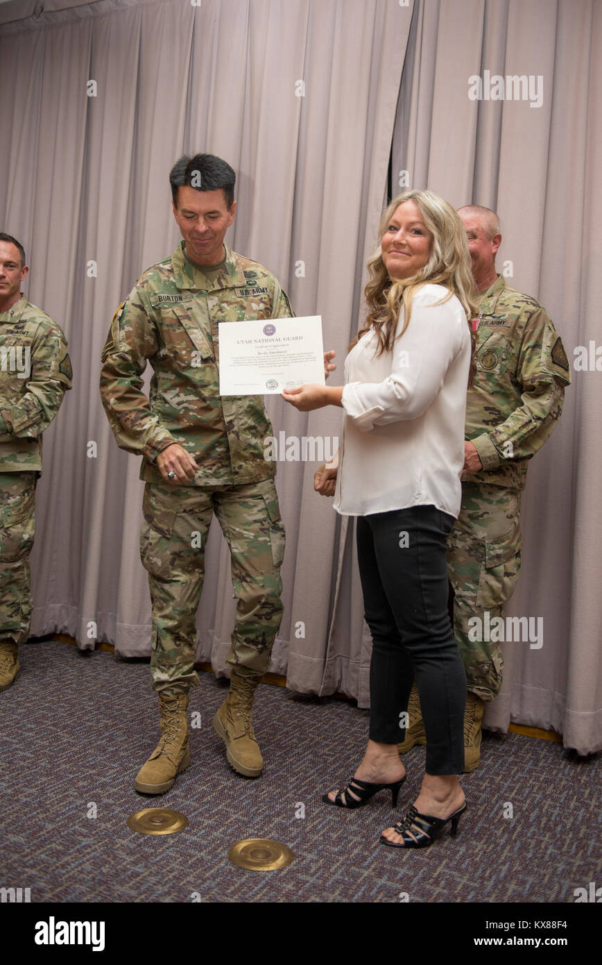 US Army National Guard with family at wards and promotion presentation ...
