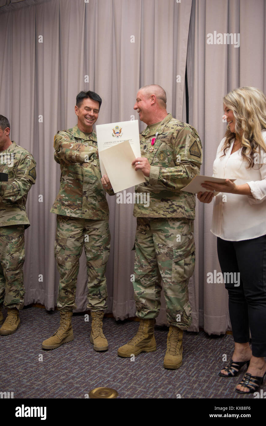 US Army National Guard with family at wards and promotion presentation ...
