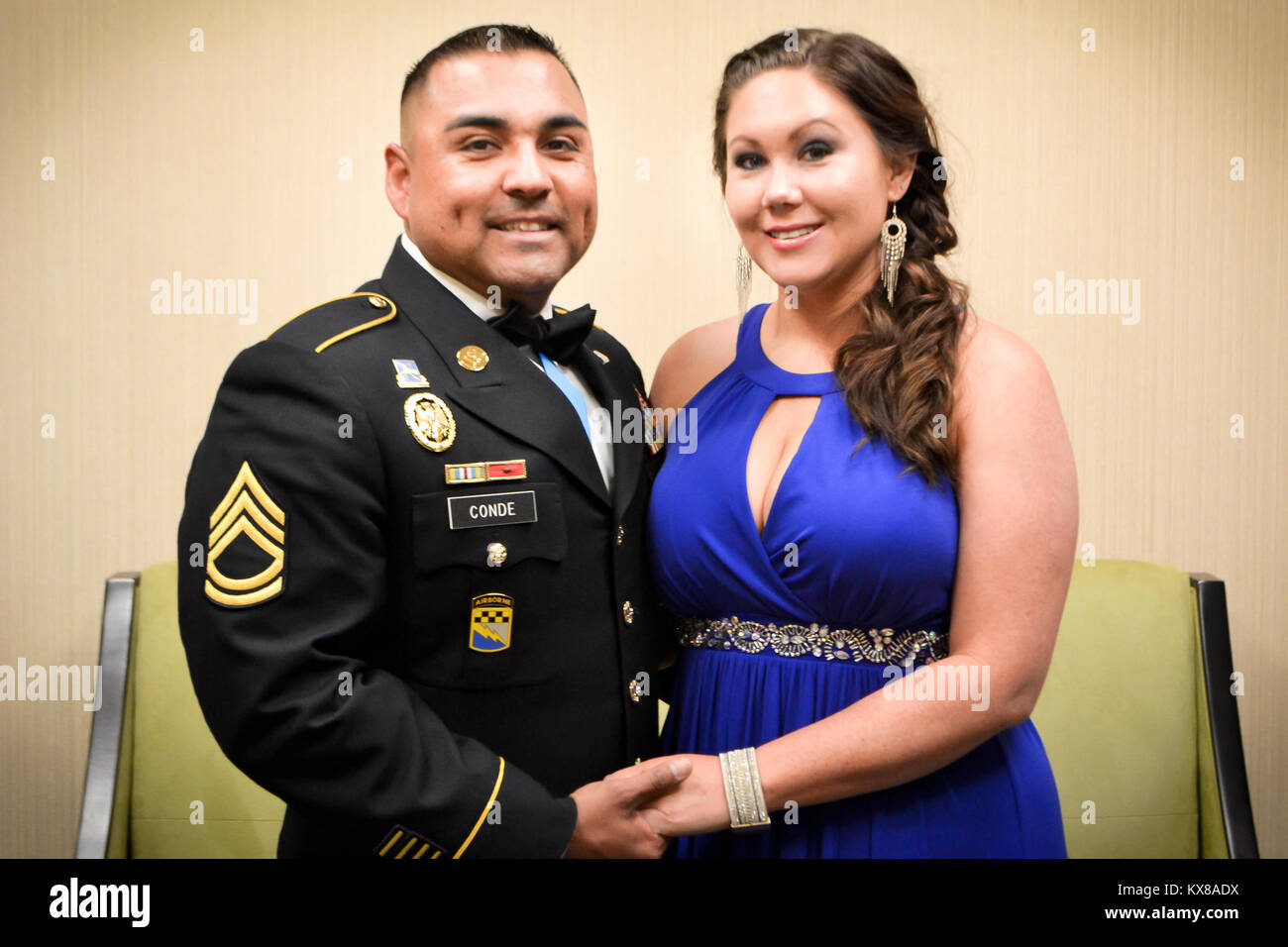 US military National Guard personnel with family and partners at awards ...