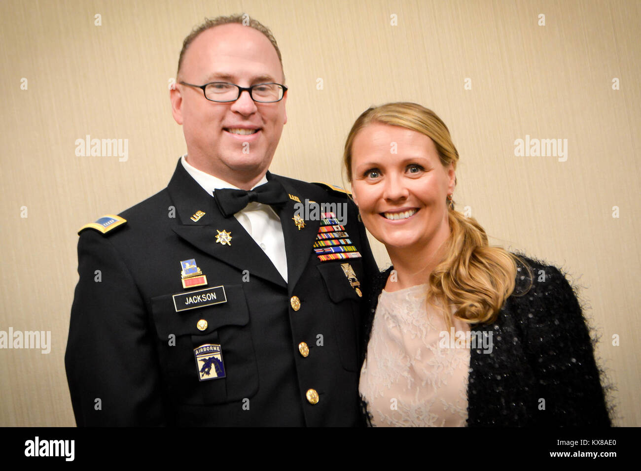 US military National Guard personnel with family and partners at awards ...