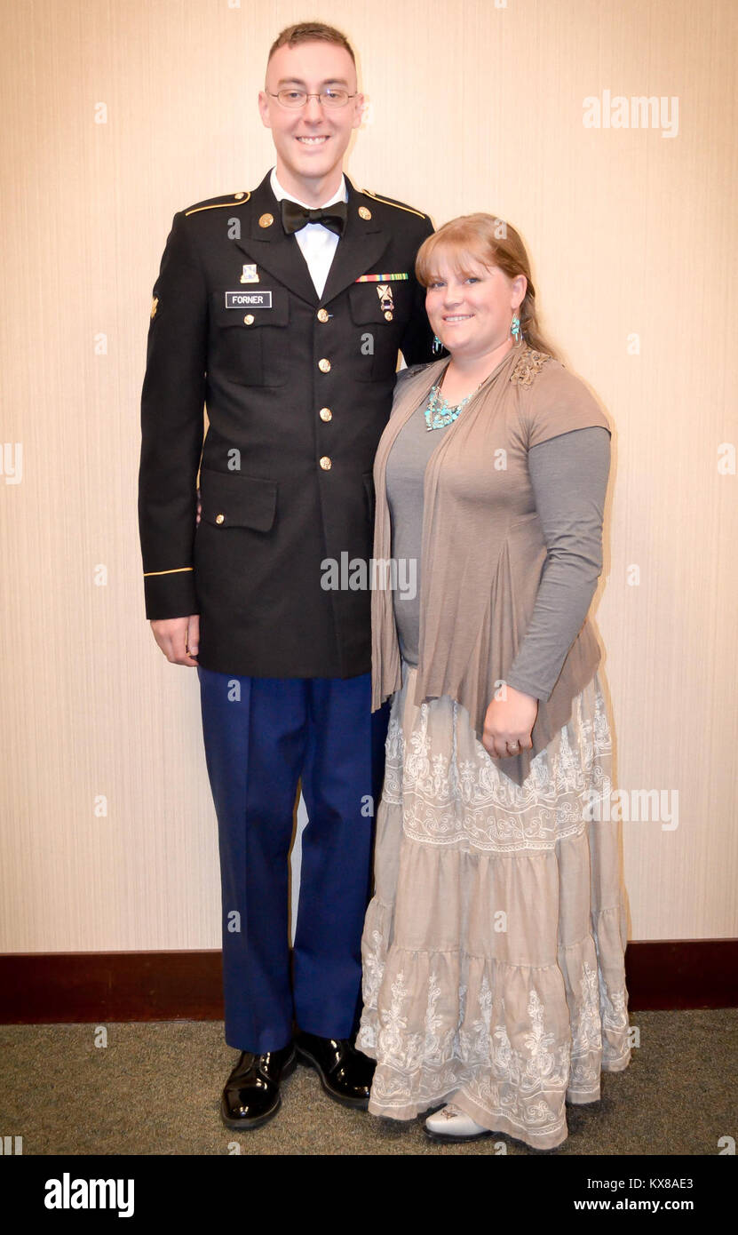 US military National Guard personnel with family and partners at awards ...