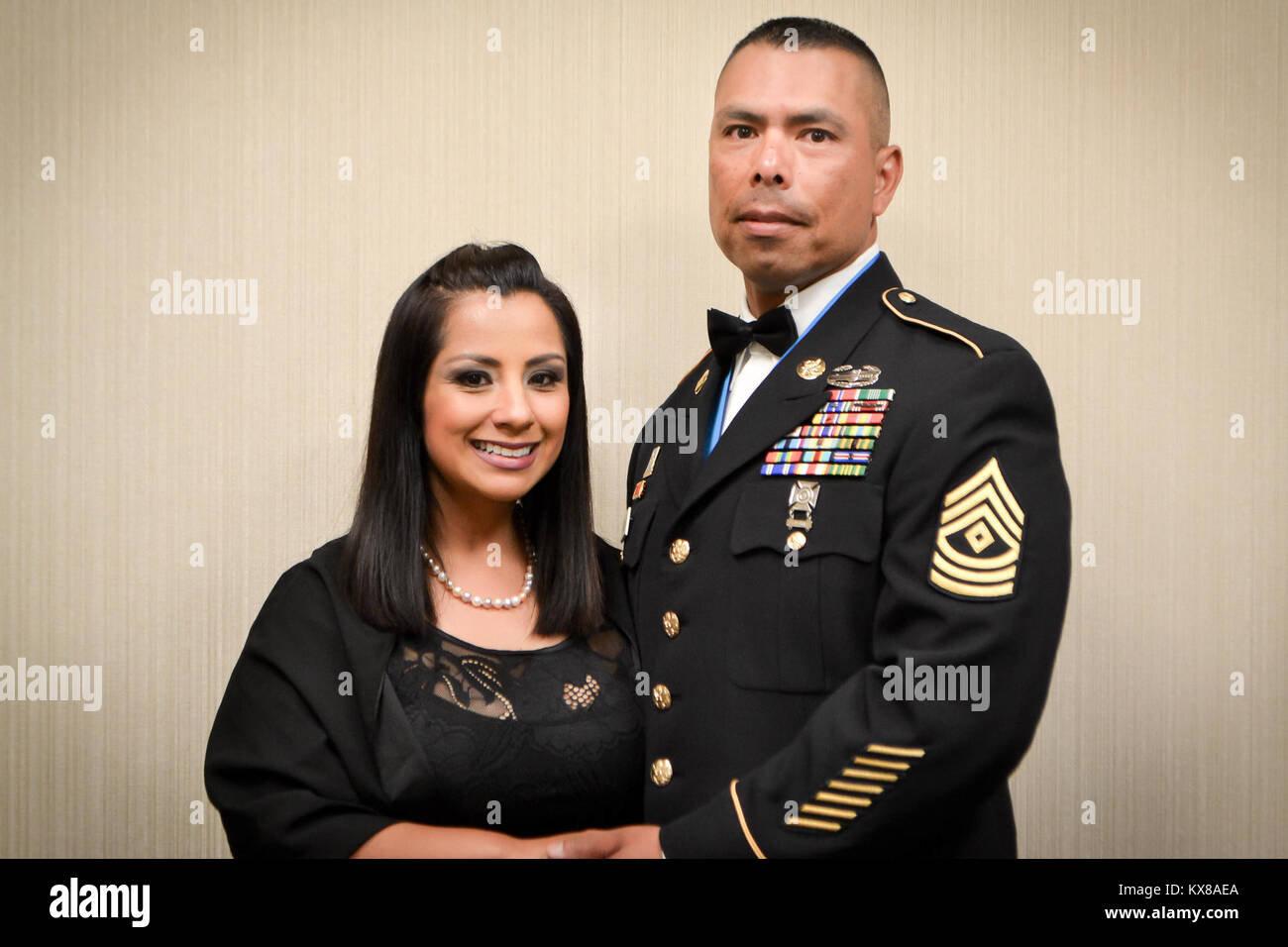 US military National Guard personnel with family and partners at awards ...