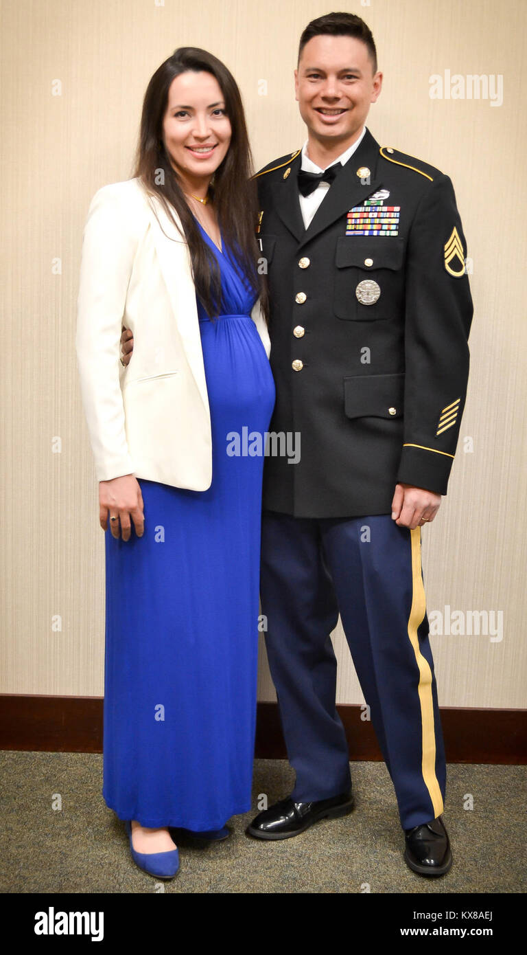US military National Guard personnel with family and partners at awards ...