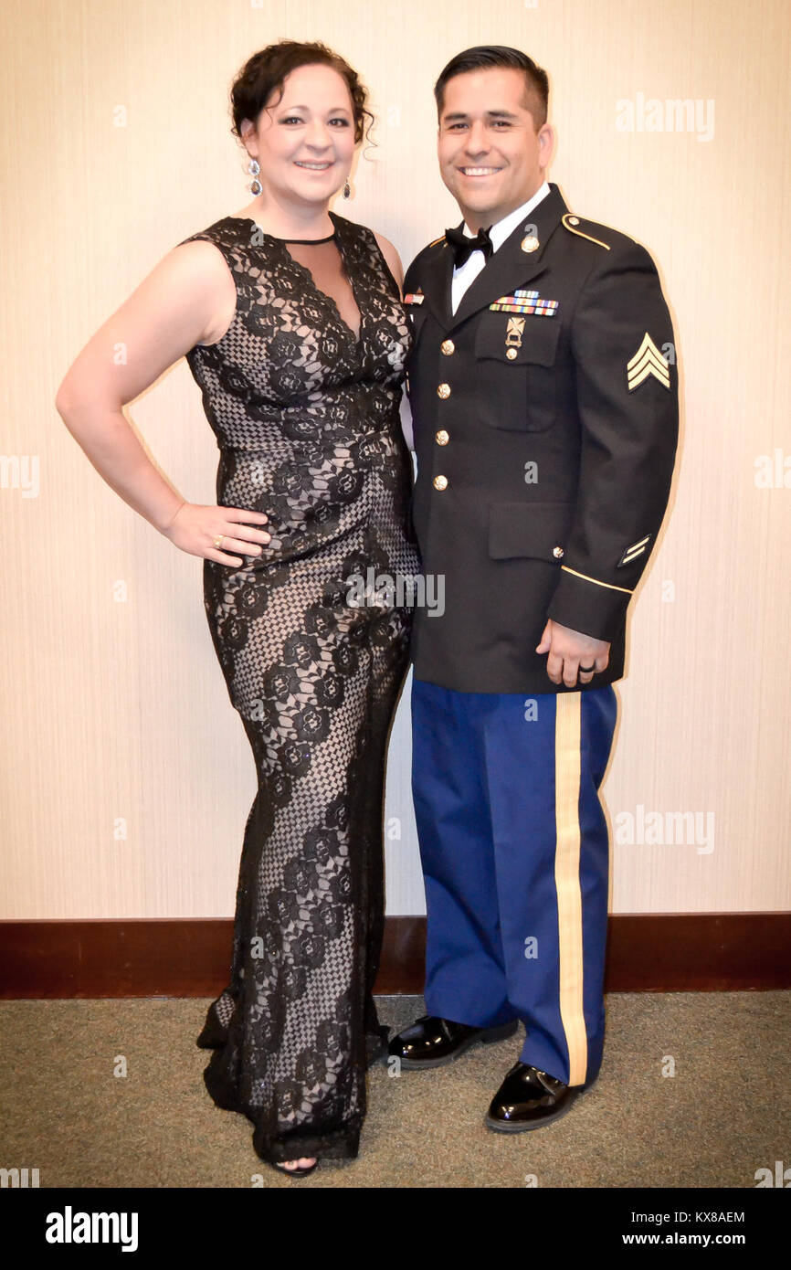 US military National Guard personnel with family and partners at awards ...
