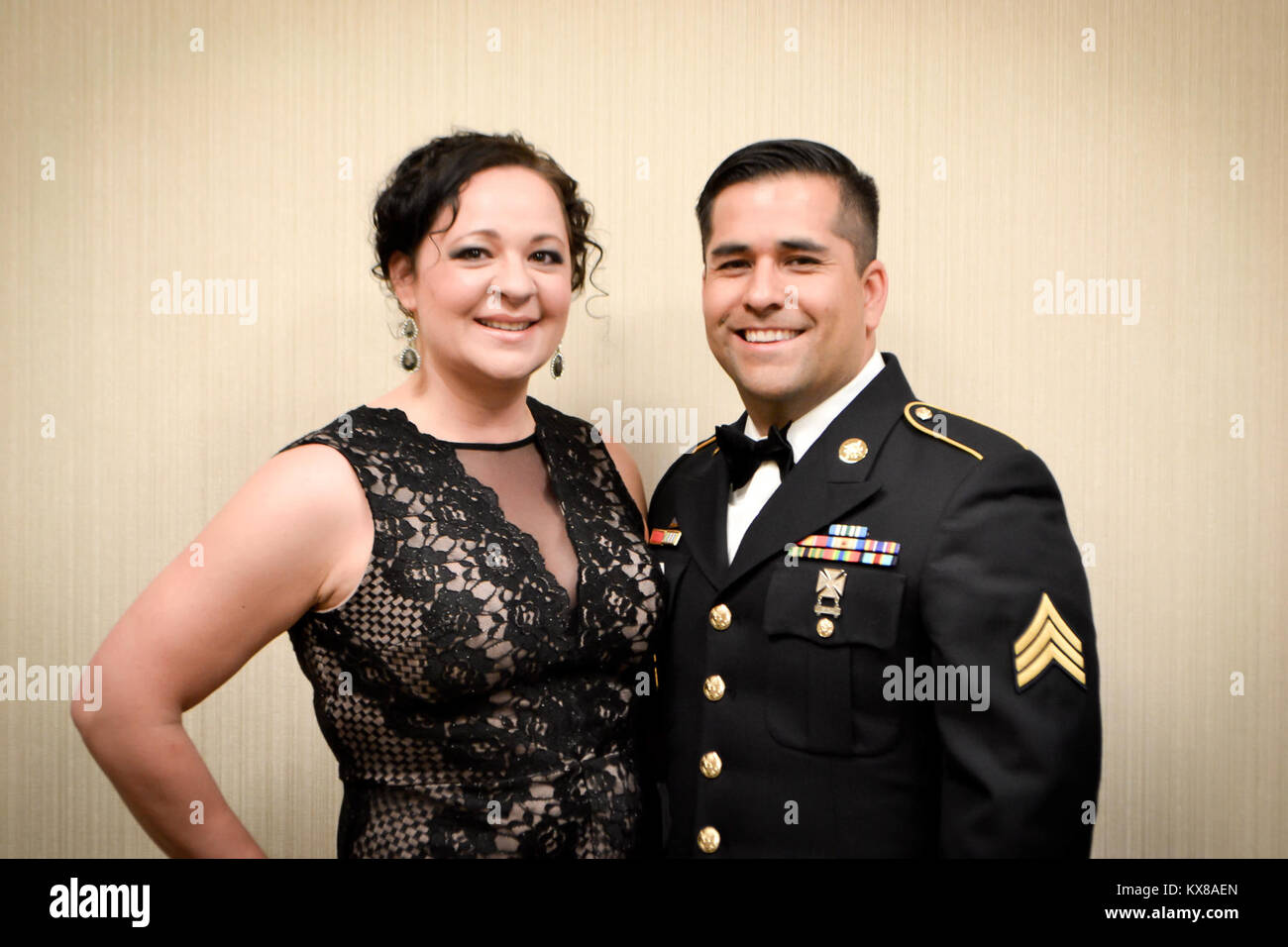 US military National Guard personnel with family and partners at awards ...