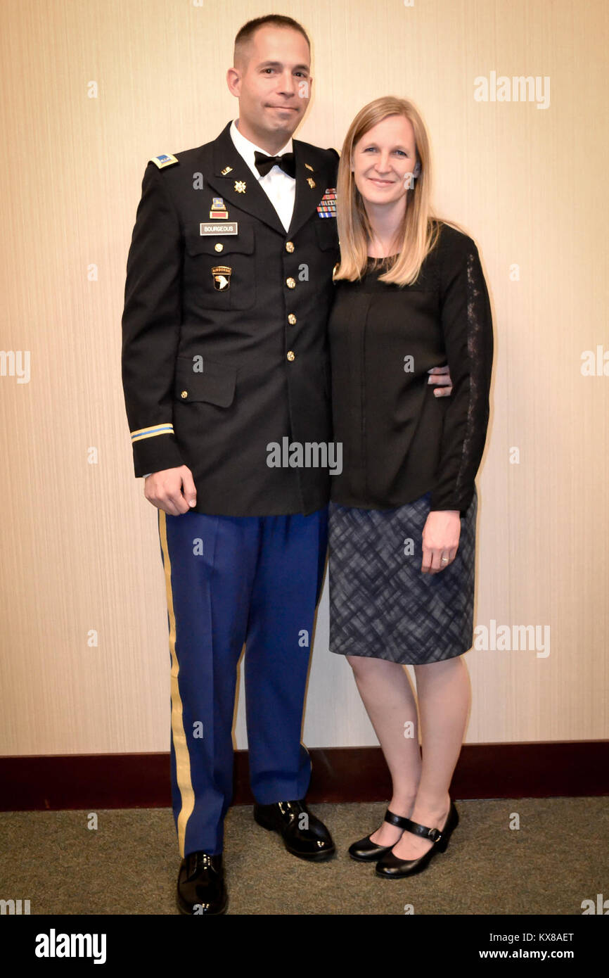 US military National Guard personnel with family and partners at awards ...