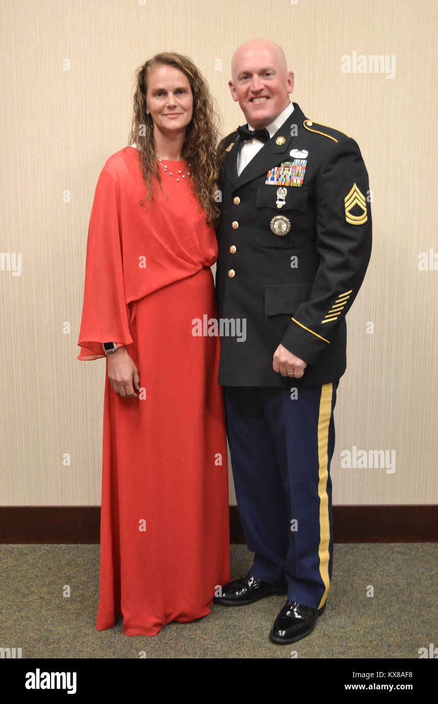 US military National Guard personnel with family and partners at awards ...