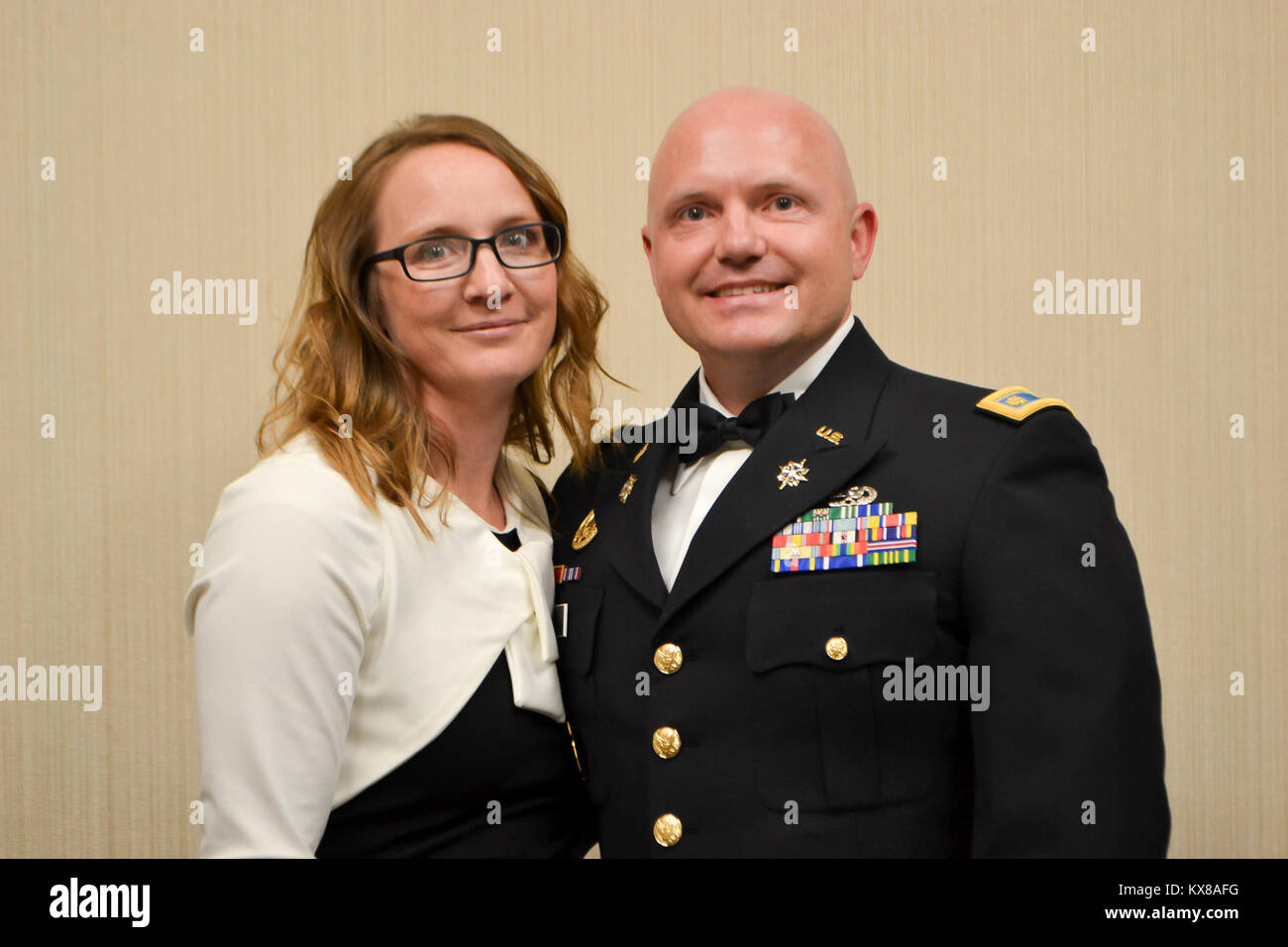 US military National Guard personnel with family and partners at awards ...