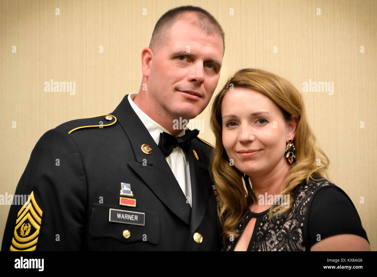 US military National Guard personnel with family and partners at awards ...