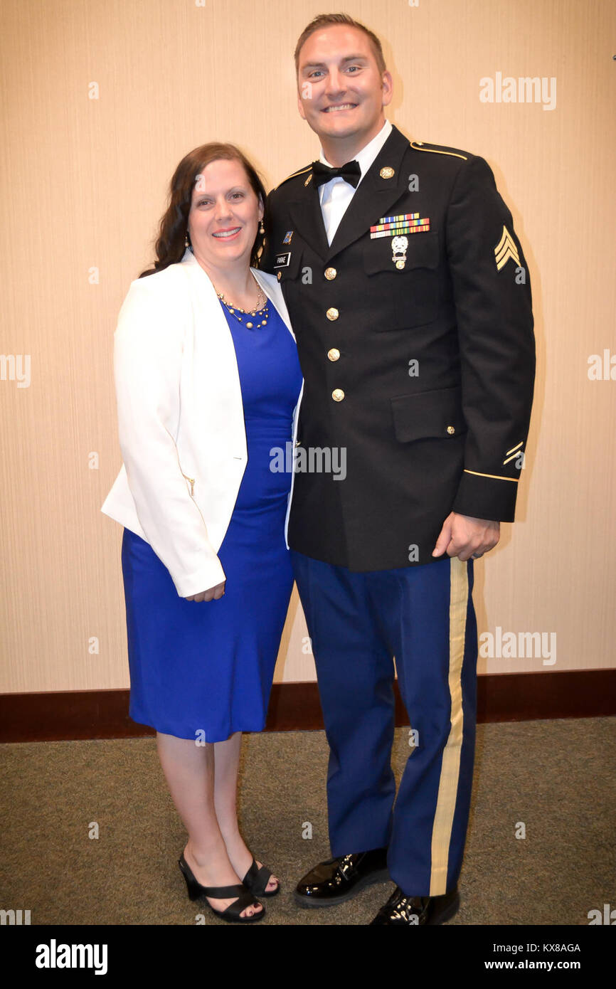 US military National Guard personnel with family and partners at awards ...