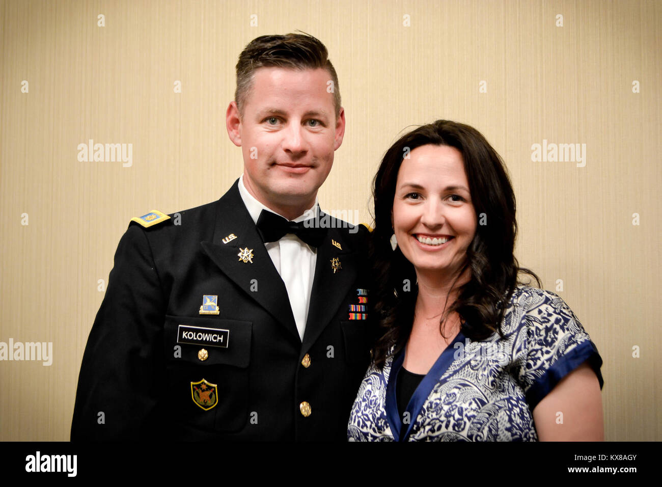 US military National Guard personnel with family and partners at awards ...