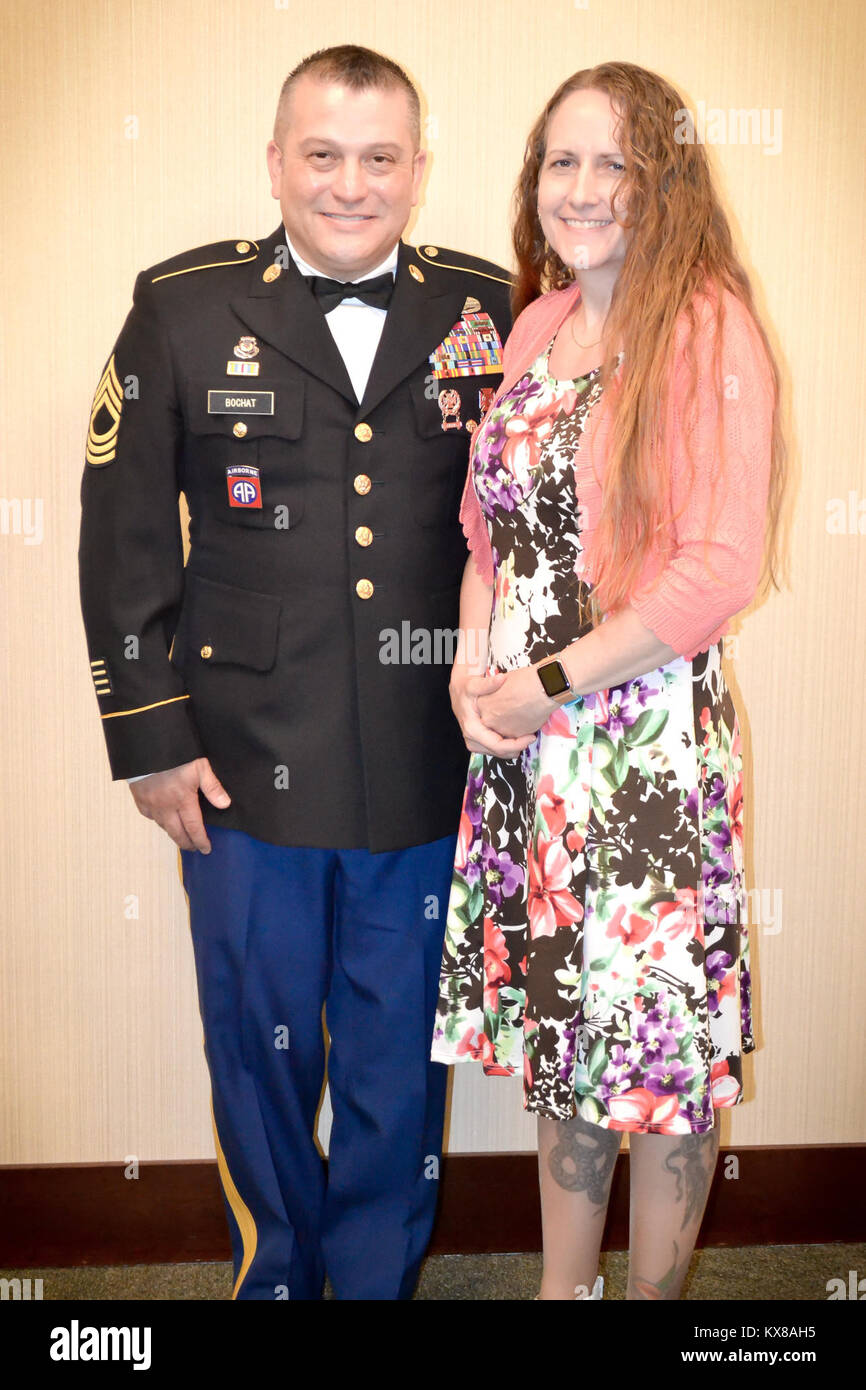 US military National Guard personnel with family and partners at awards ...