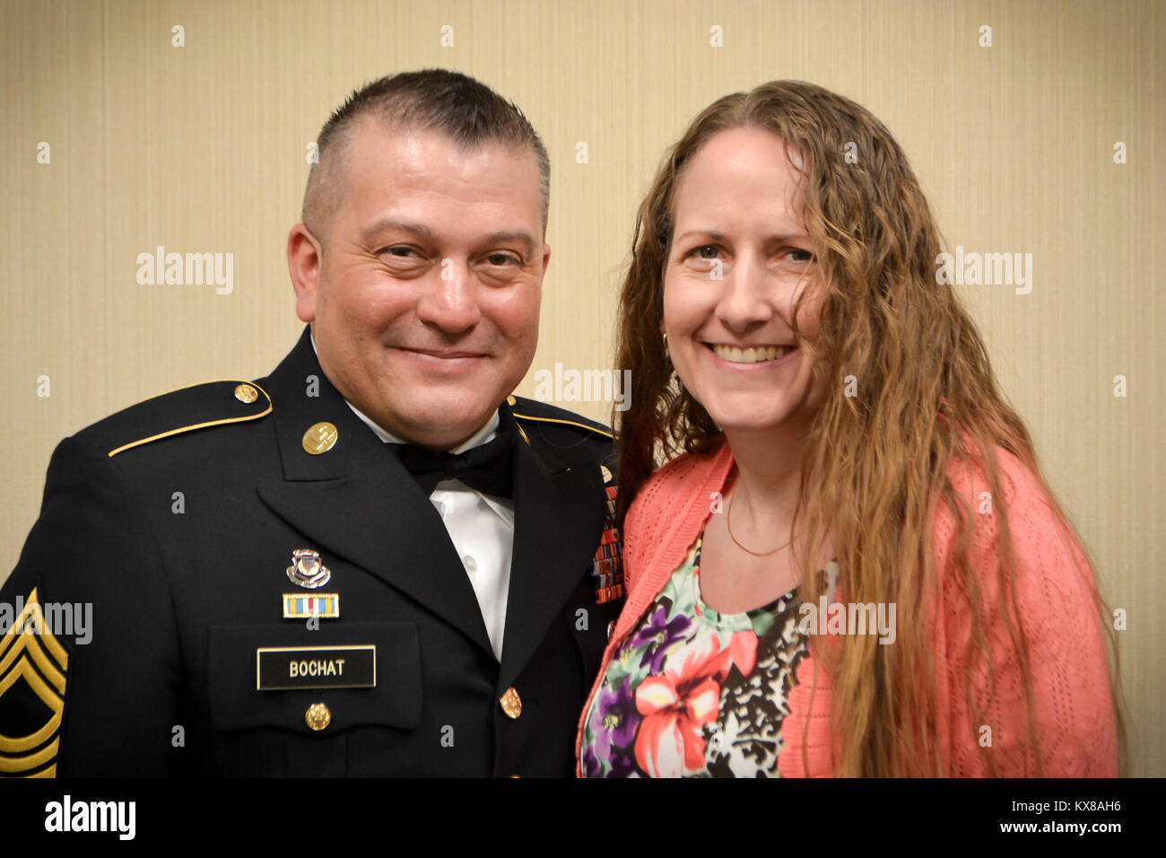US military National Guard personnel with family and partners at awards ...