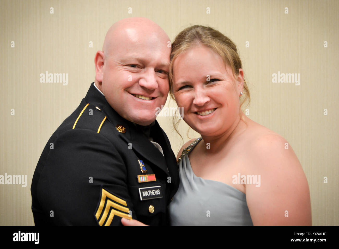 US military National Guard personnel with family and partners at awards ...