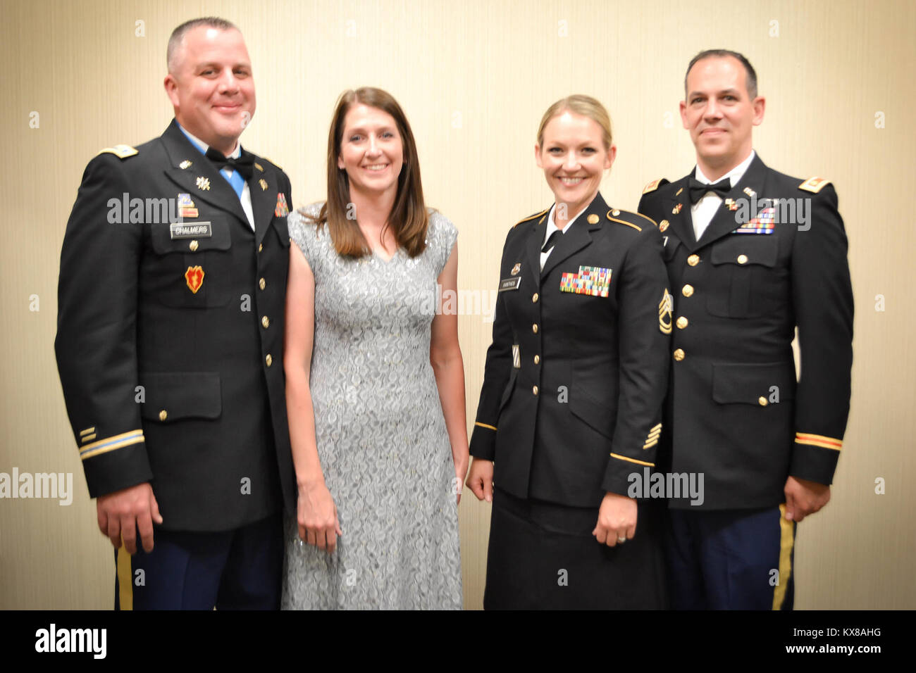 US military National Guard personnel with family and partners at awards ...