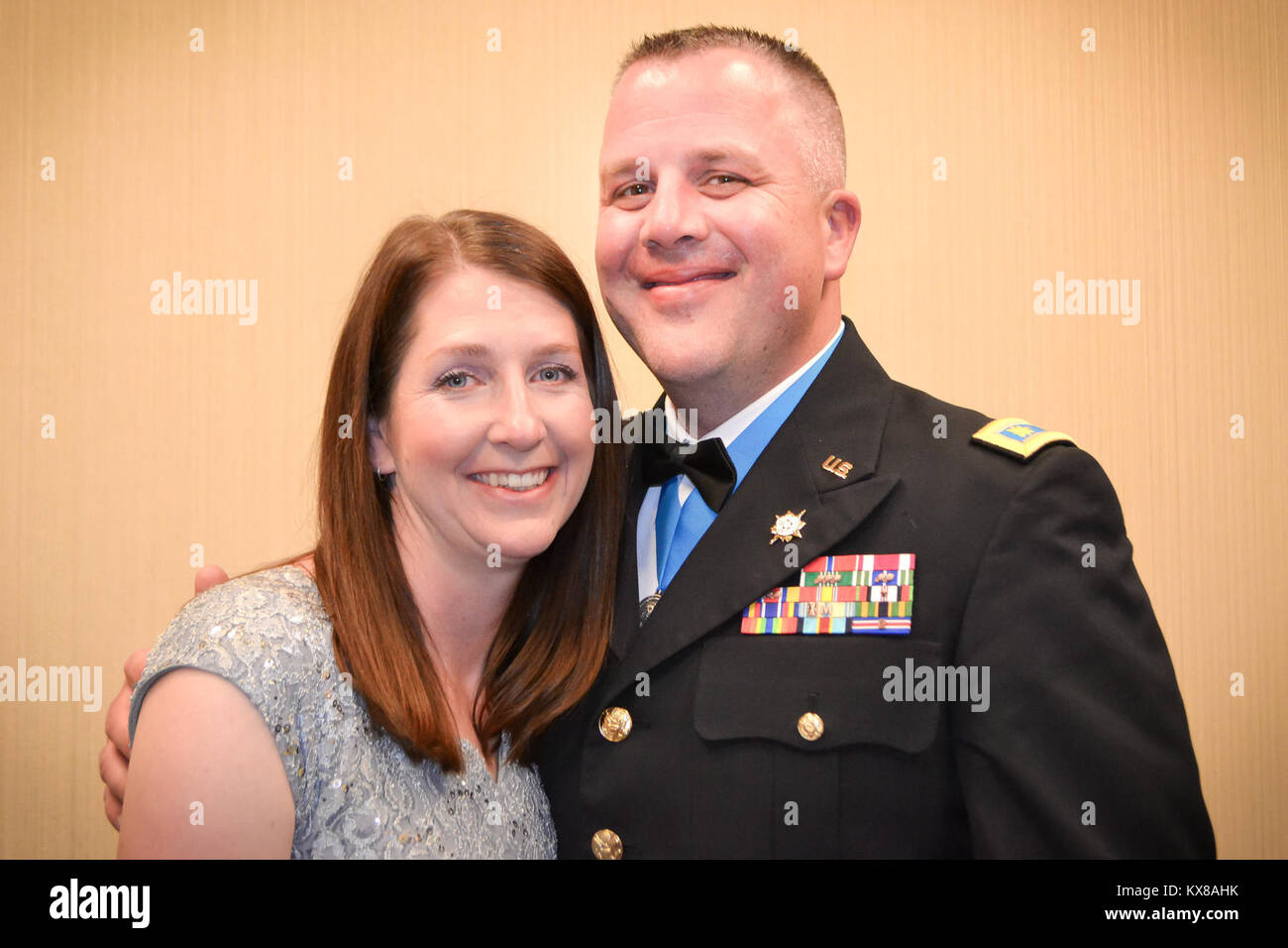 US military National Guard personnel with family and partners at awards ...