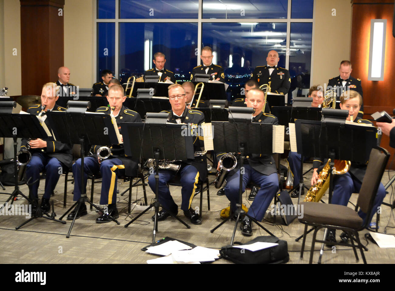 US military National Guard personnel with family and partners at awards ...