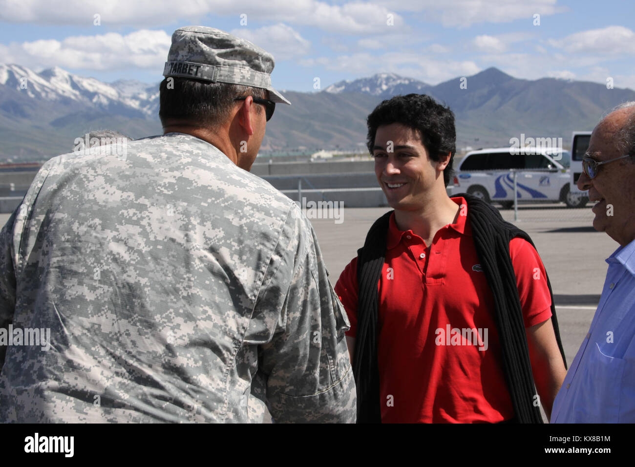 US military National Guard personnel with family and partners at awards ...