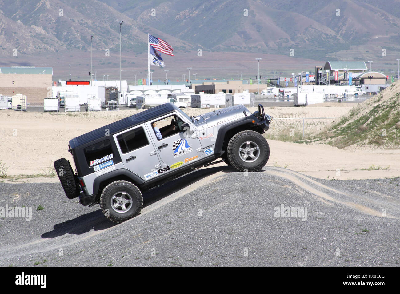 US Army National Guard off road driving in civilian Jeep Stock Photo ...