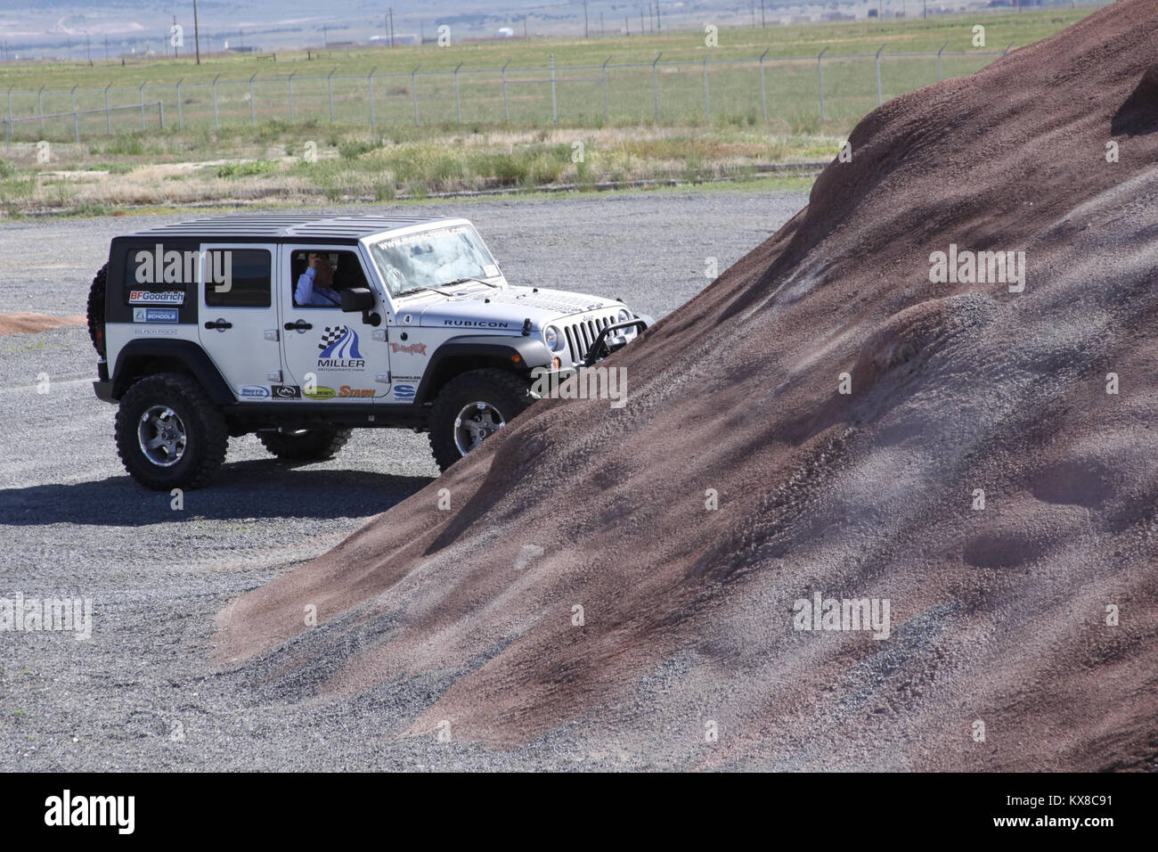 US Army National Guard off road driving in civilian Jeep Stock Photo ...