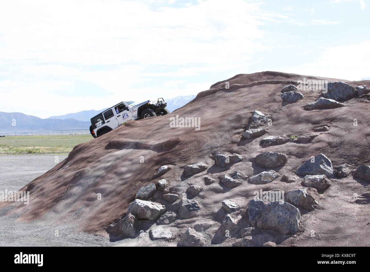 US Army National Guard off road driving in civilian Jeep Stock Photo ...