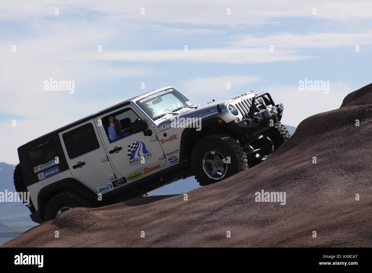 US Army National Guard off road driving in civilian Jeep Stock Photo ...