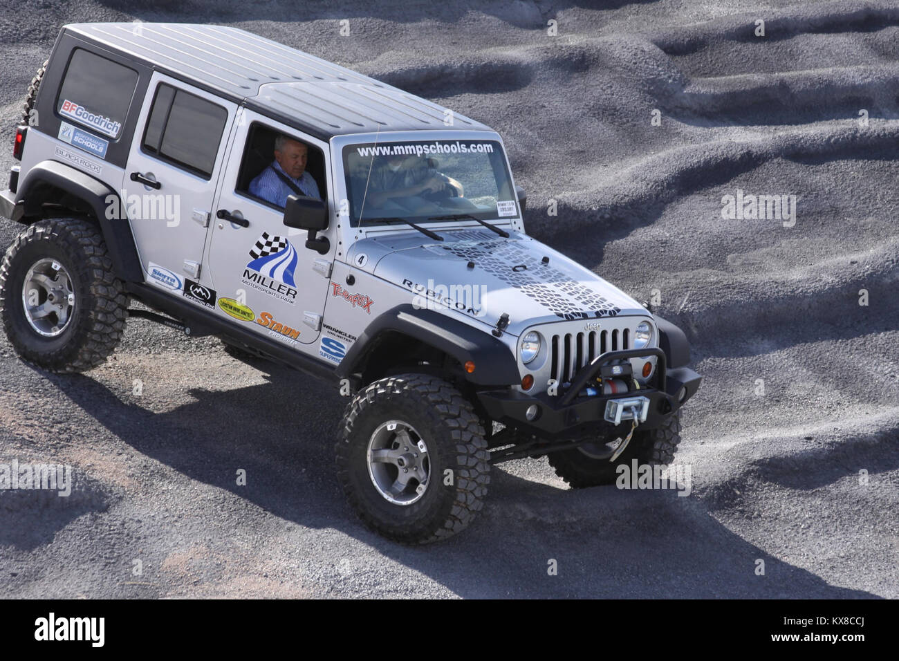 US Army National Guard off road driving in civilian Jeep Stock Photo ...
