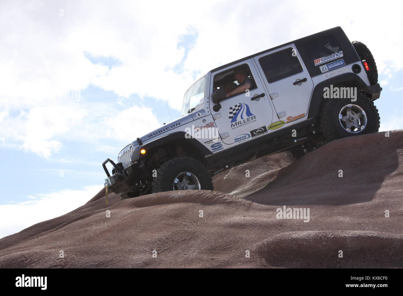 US Army National Guard off road driving in civilian Jeep Stock Photo ...