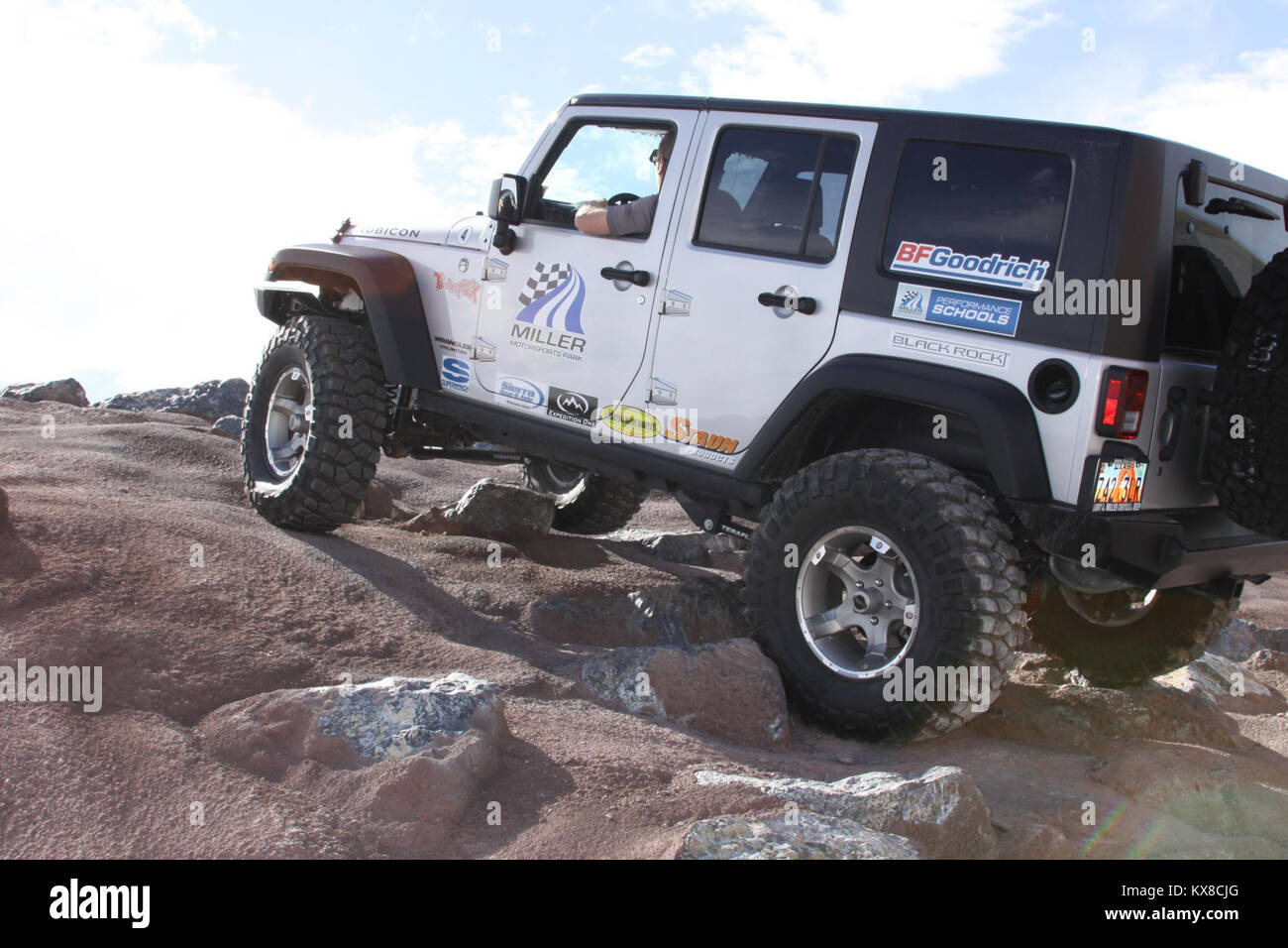 US Army National Guard off road driving in civilian Jeep Stock Photo ...